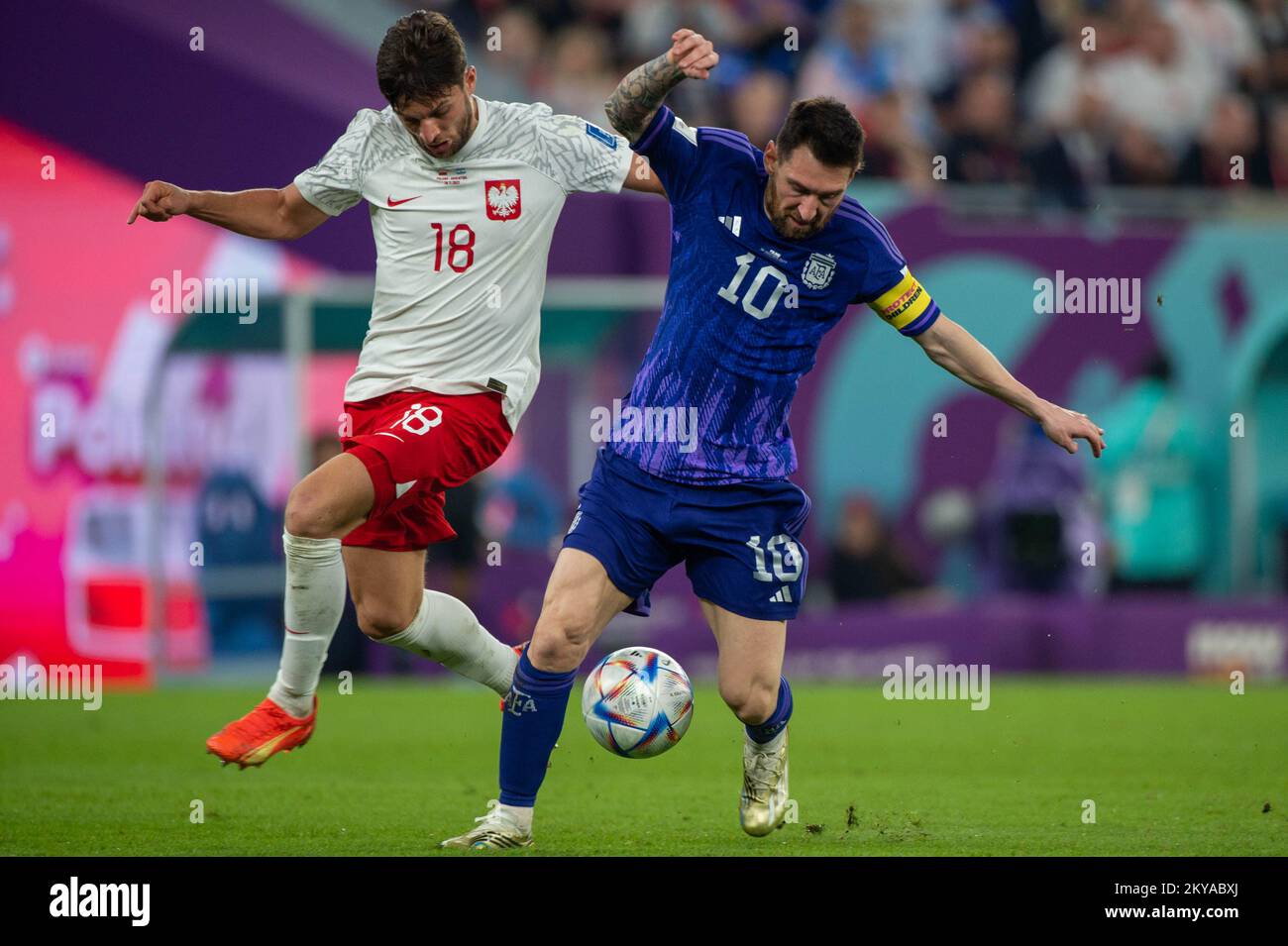 Lionel Messi of Argentina and Bartosz Bereszynski of Poland during the FIFA World Cup Qatar 2022 ...