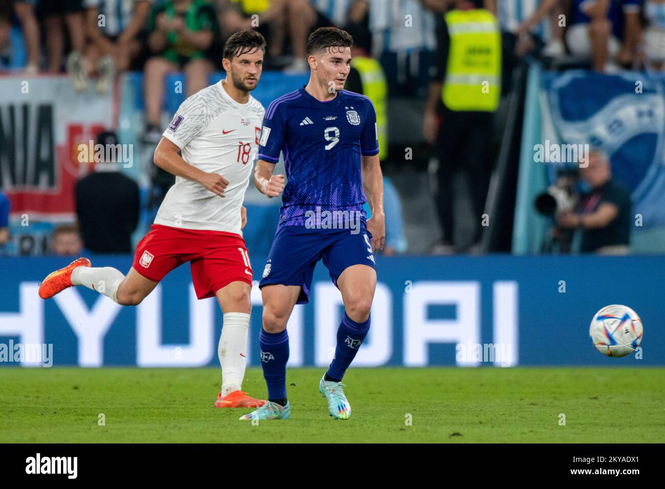 Bartosz Bereszynski of Poland and Julian Alvarez of Argentina during the FIFA World Cup Qatar ...