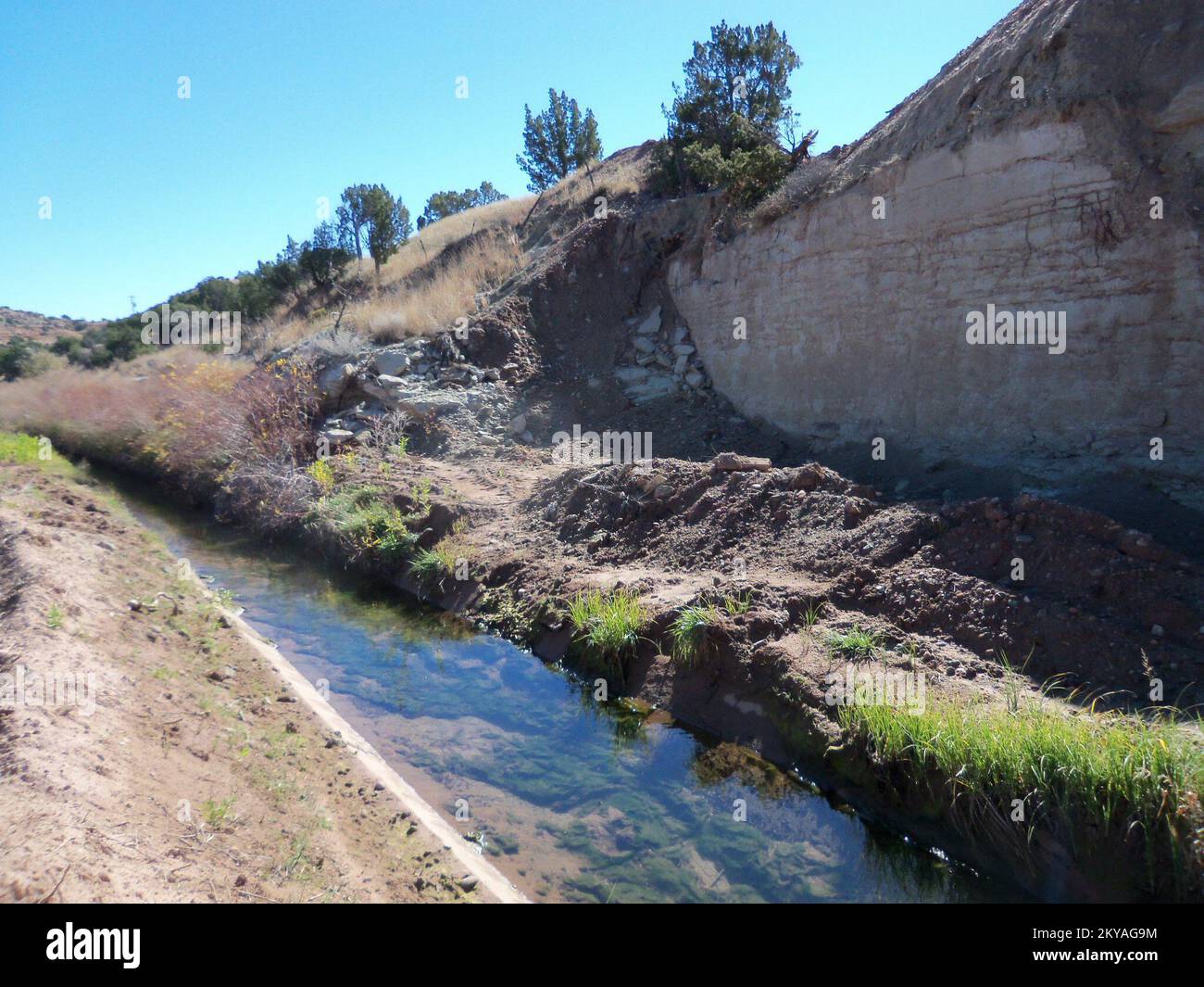 This acequia in New Mexico is art of the East Puerto De Luna Community ...