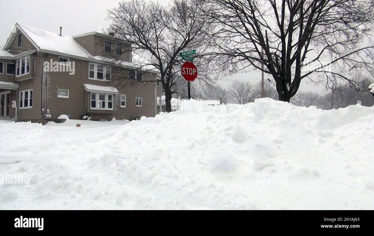 A winter storm brought heavy snow to Arlington, MA. The snow piled high ...