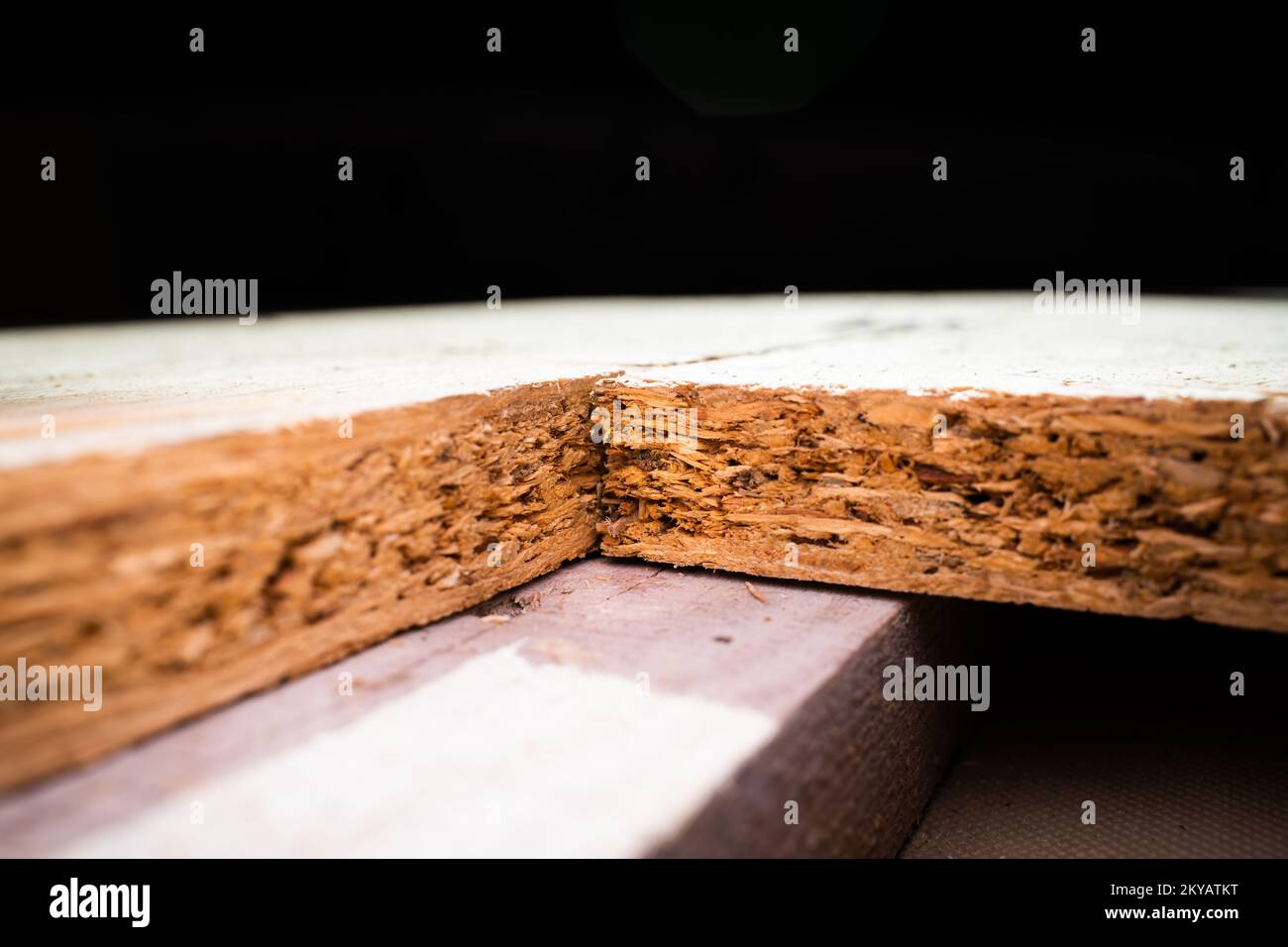 Osb plate in the cut close-up. Pressed wooden slab from woodworking ...