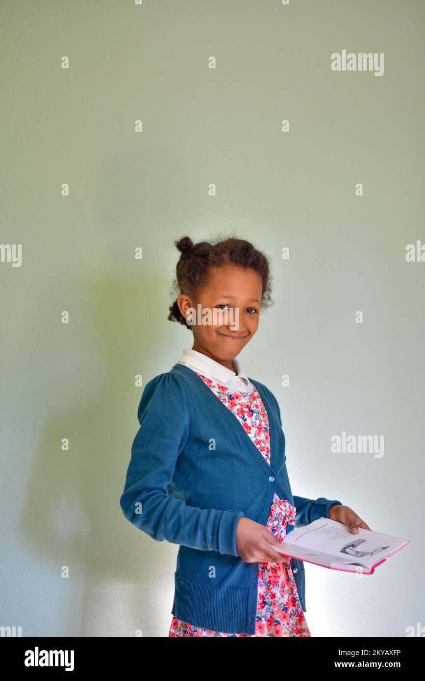 Little Girl Standing Looking Up