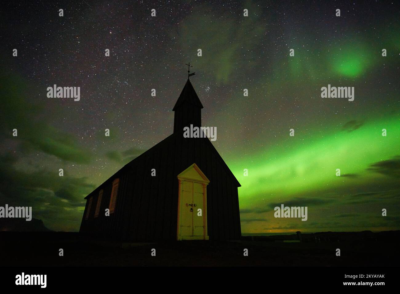 Auroras dance over the Snæfellsnes Peninsula, painting the night sky ...