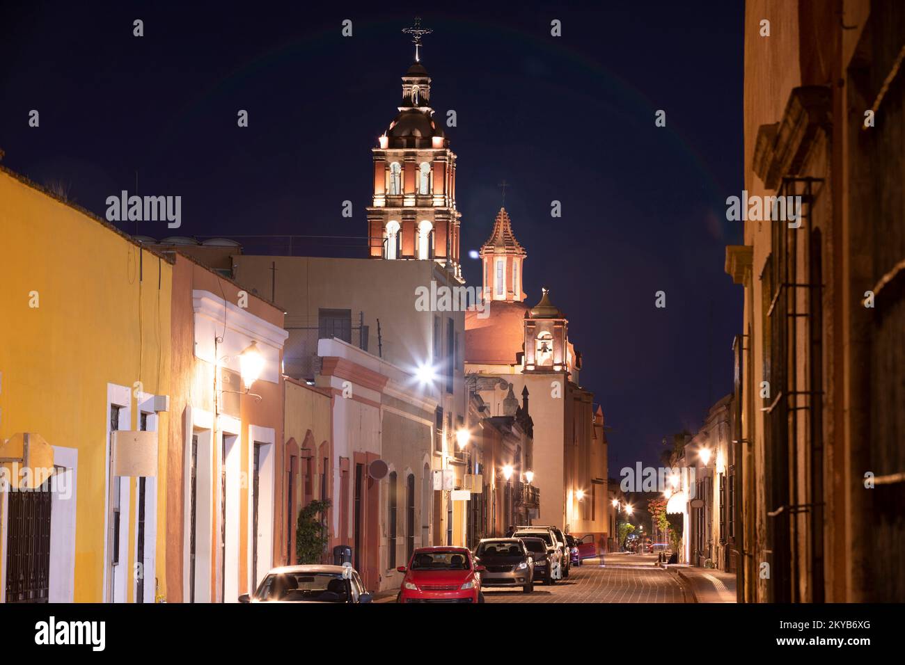 Twilight view of the colonial architecture and historic church of ...