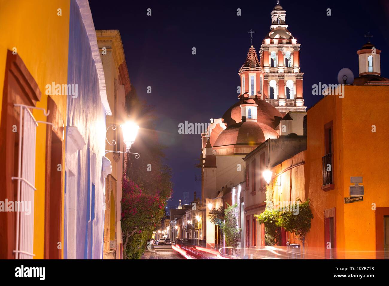 Twilight view of the colonial architecture and historic church of ...