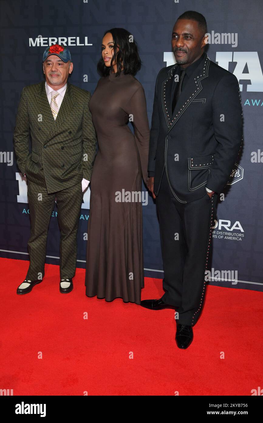 Christian Louboutin, Sabrina Dhowre Elba and Idris Elba attend the 36th ...
