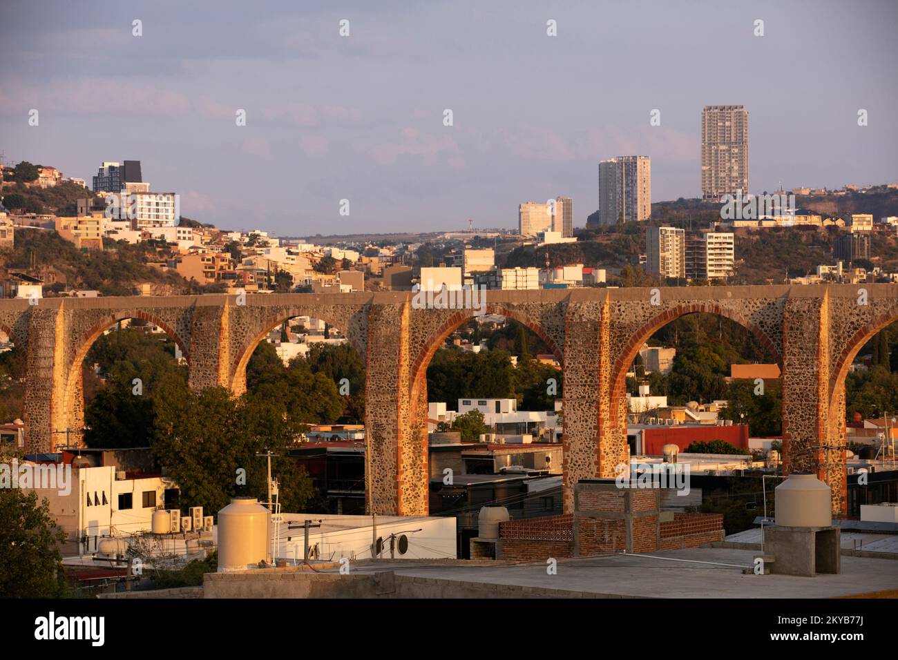 Sunset view of colonial architecture and contemporary skyline of ...