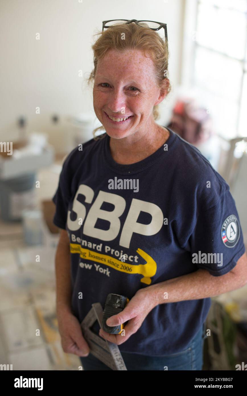 Saint Bernard Project volunteer, Suzanne O'Rahilly paints, drywalls and ...