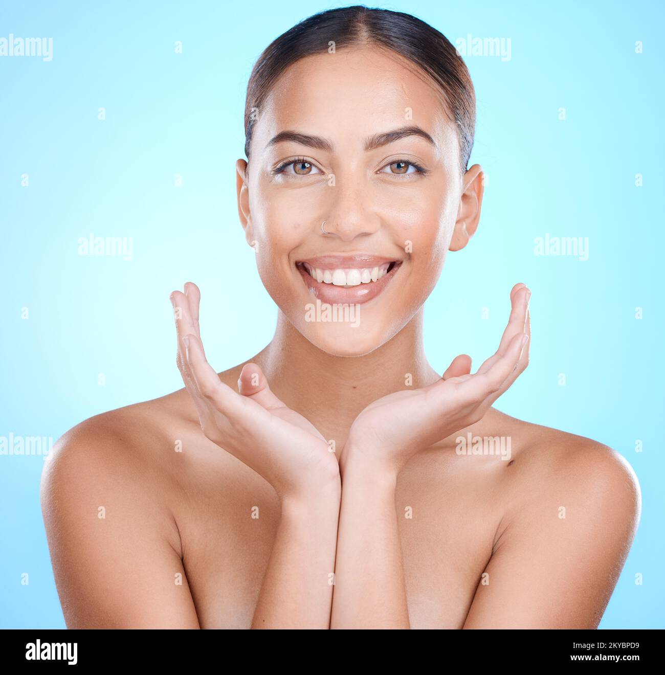 Portrait, skincare and woman with hands on face in studio for beauty ...