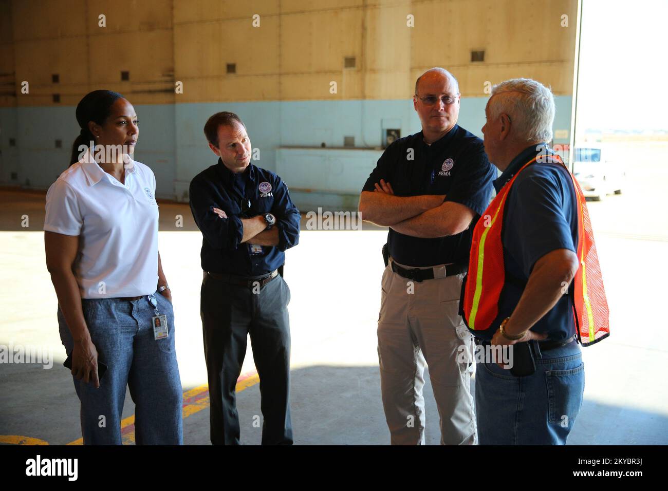 FEMA Operations Section Chief Mark Armstrong (R) explains the ...