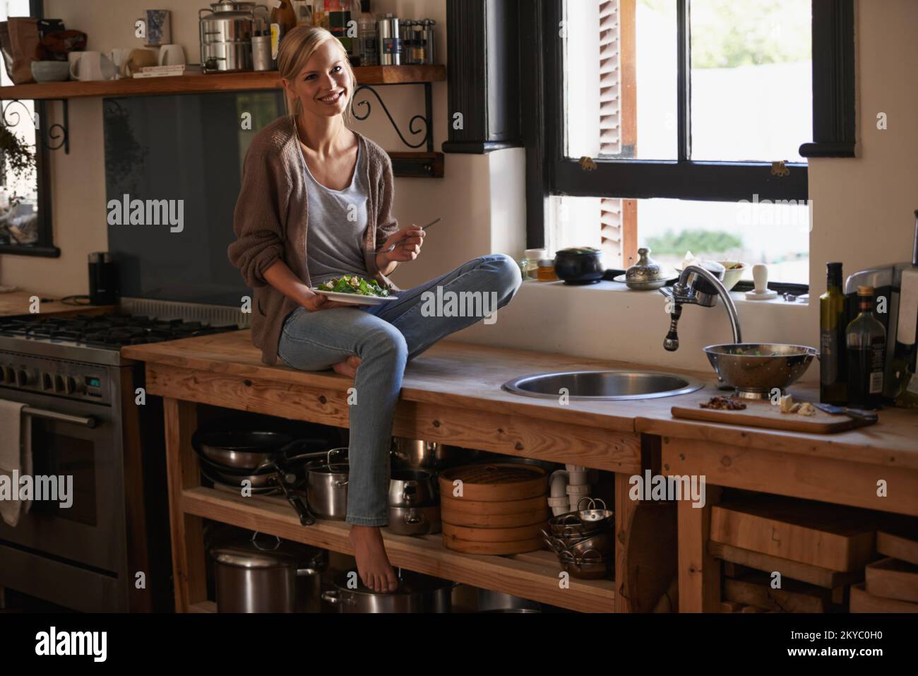 Feeling great through good food. Portrait of an attractive young woman ...