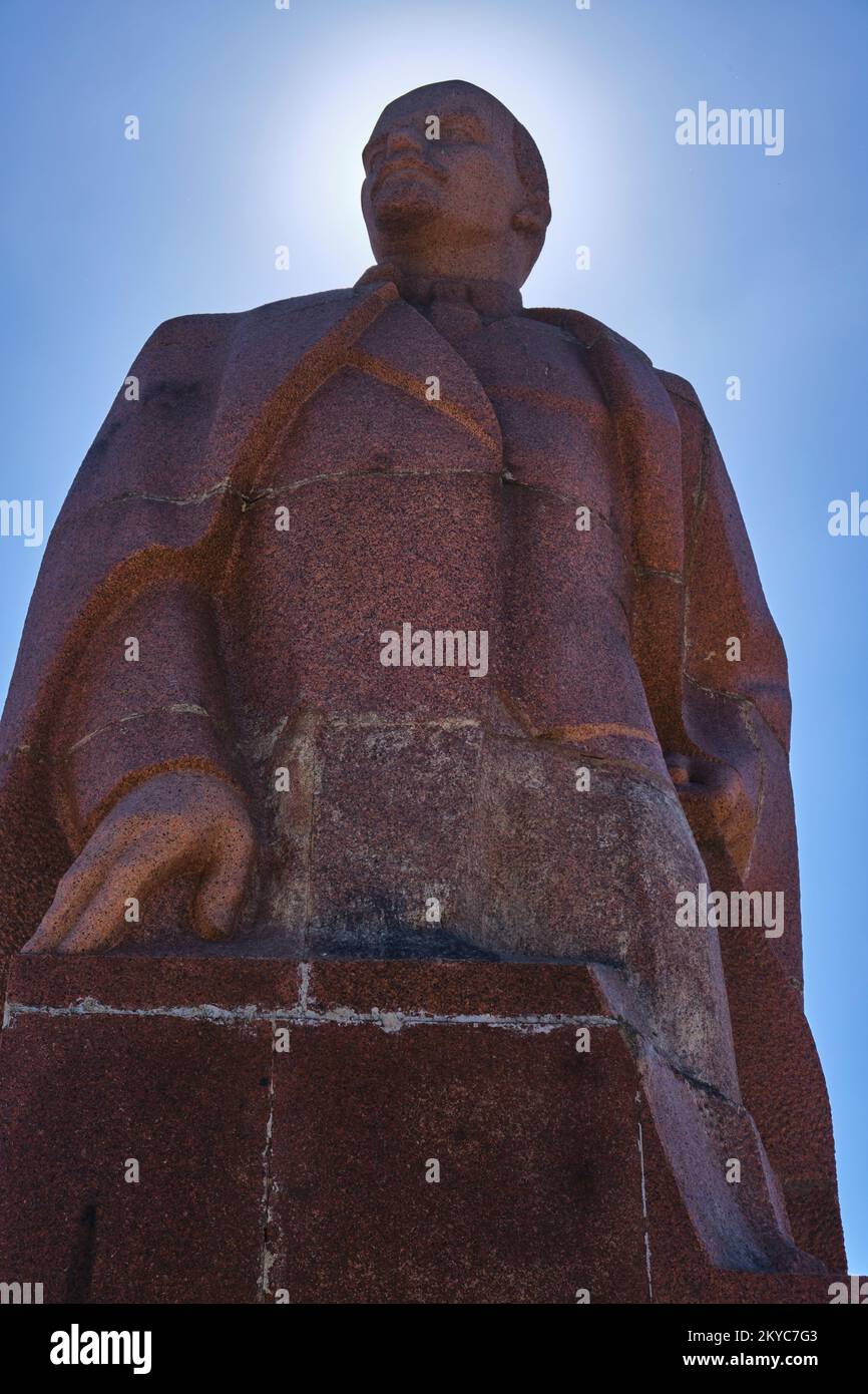 A red granite, stone, marble sculpture, statue of Soviet, Russian ...