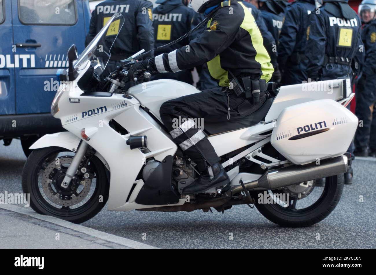 Motor patrol. A police man riding on his motorcycle down the road Stock ...