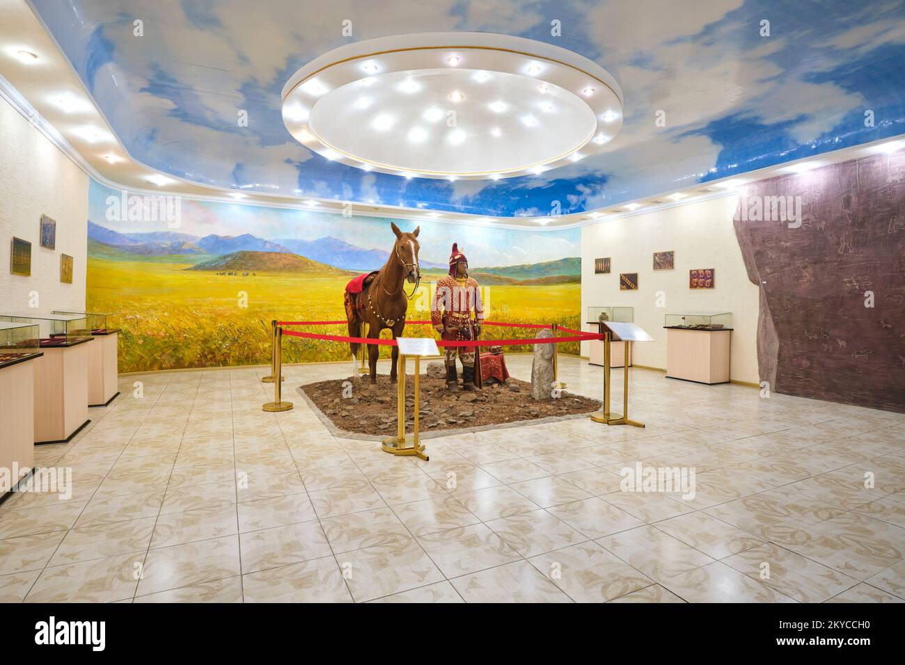 A statue of the symbol of Kazakhstan, The Golden Man with his horse. At ...