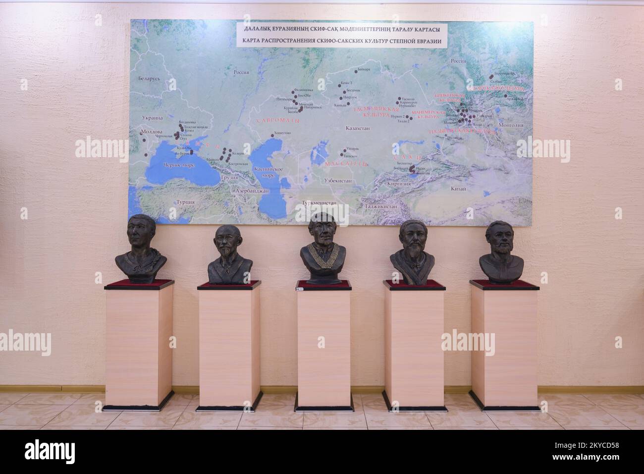 Bust statues, sculptures of various ethnic Kazakh leaders with a map ...