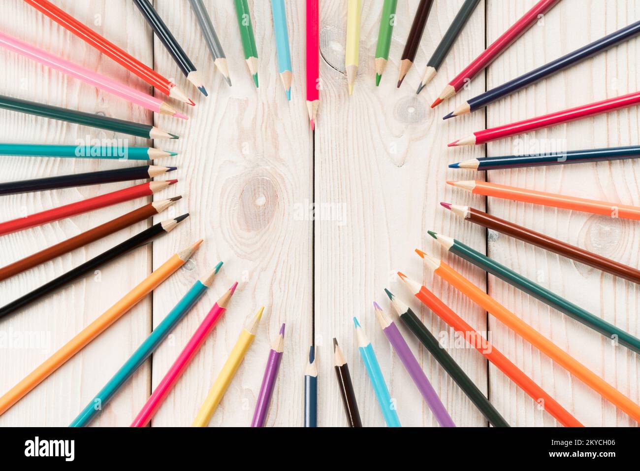 Composition of colorful pencils forming heart shape by slate pencils on ...