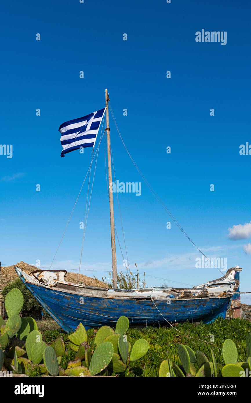 Little fishing boat in a garden, Mykonos, Greece Stock Photo - Alamy