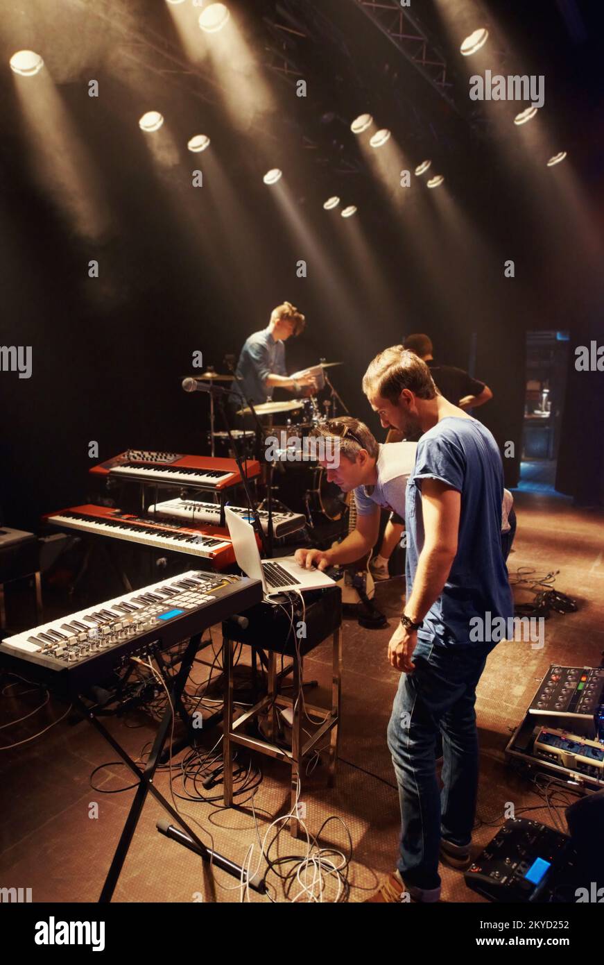 A keyboardist rocking out on stage. This concert was created for the ...