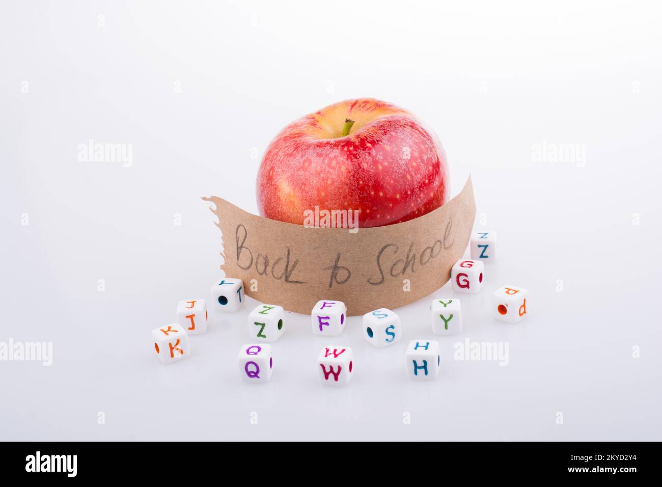 Back to school theme with a red apple Stock Photo - Alamy