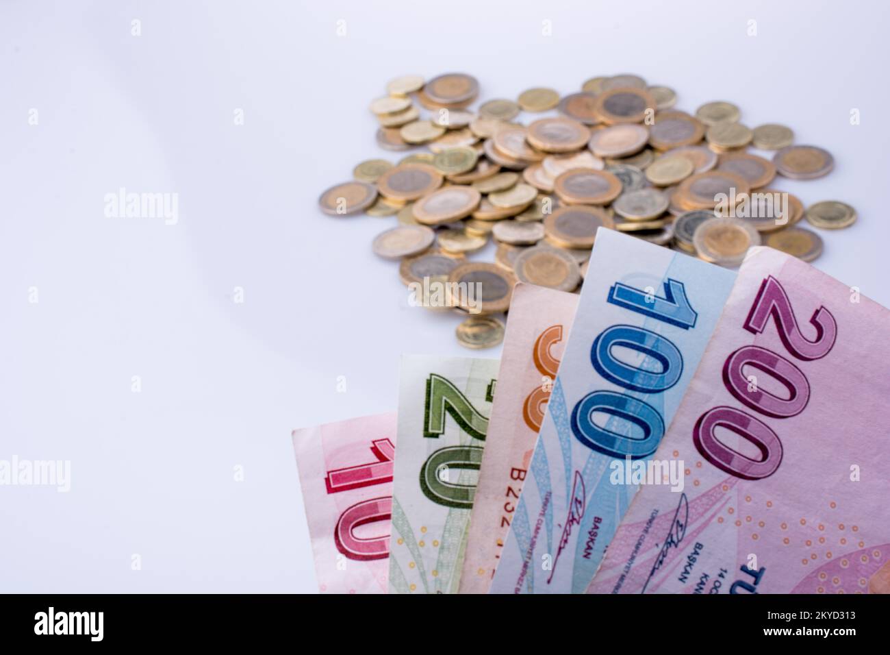 Turkish Lira coins and banknotes side by side on white background Stock ...