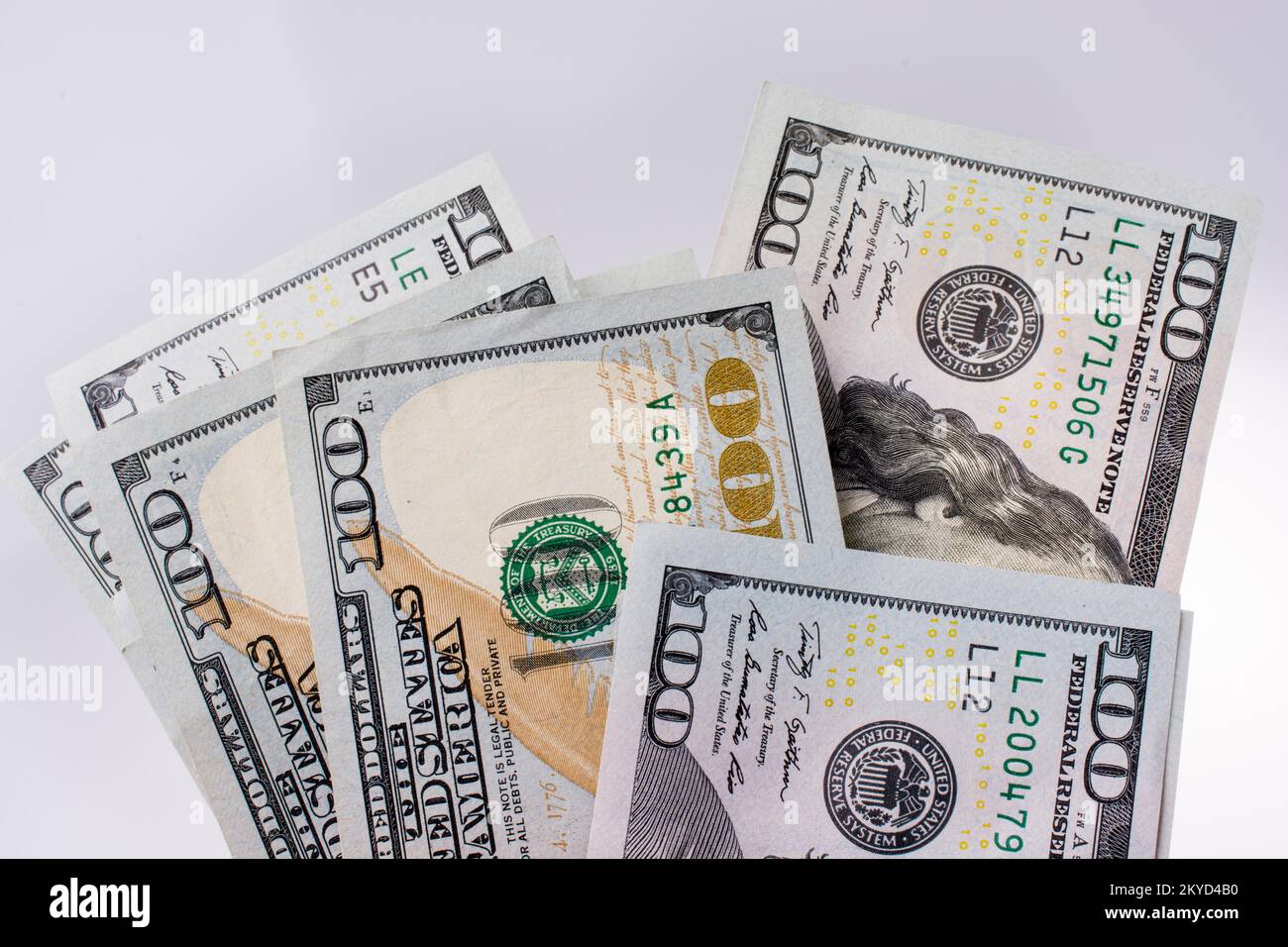 American 100 dollar banknotes made of paper placed on white background ...