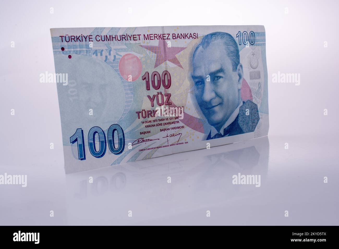 Turksh Lira banknotes of 100 Lira on white background Stock Photo - Alamy