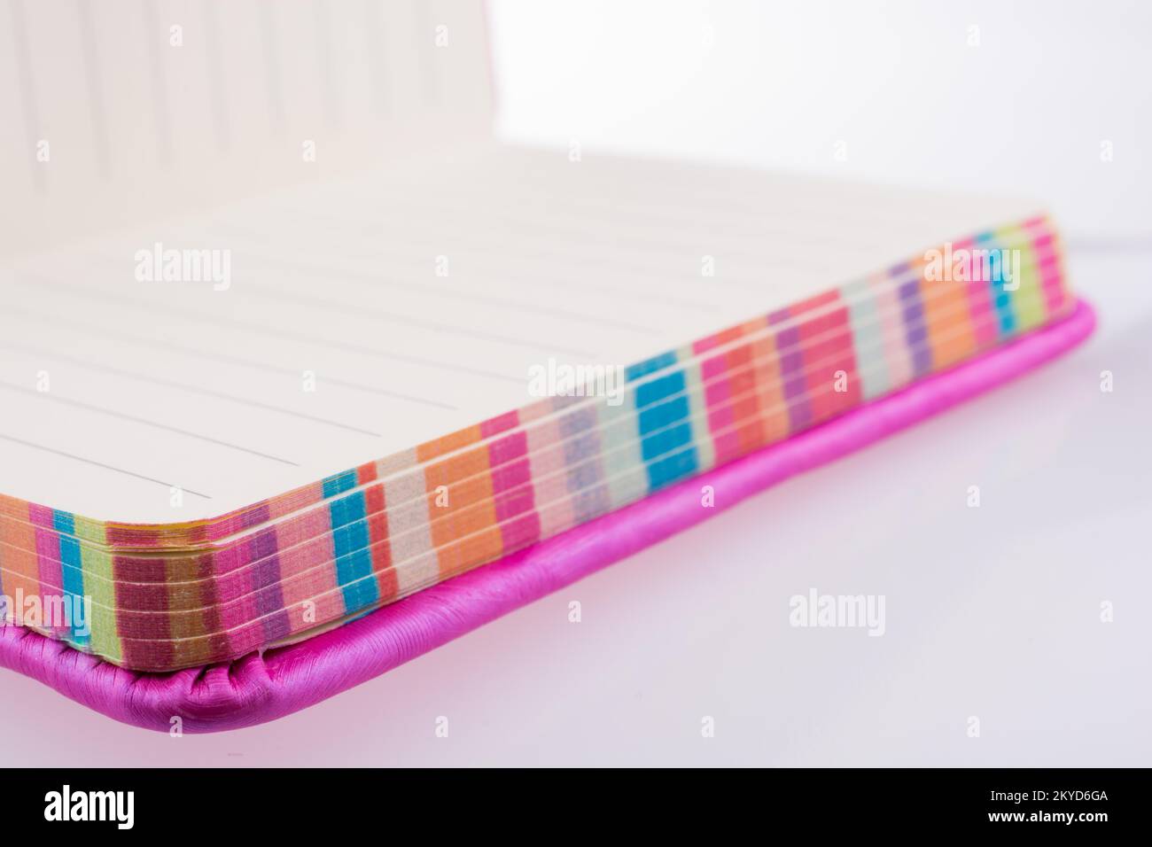 Colorful diary on a white background Stock Photo - Alamy