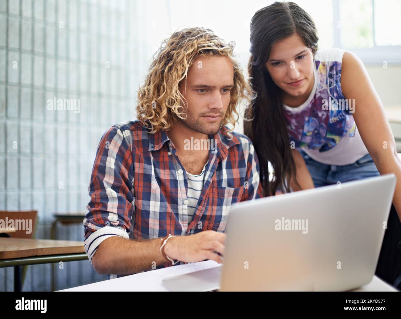 Two adult students in classroom hi-res stock photography and images - Alamy