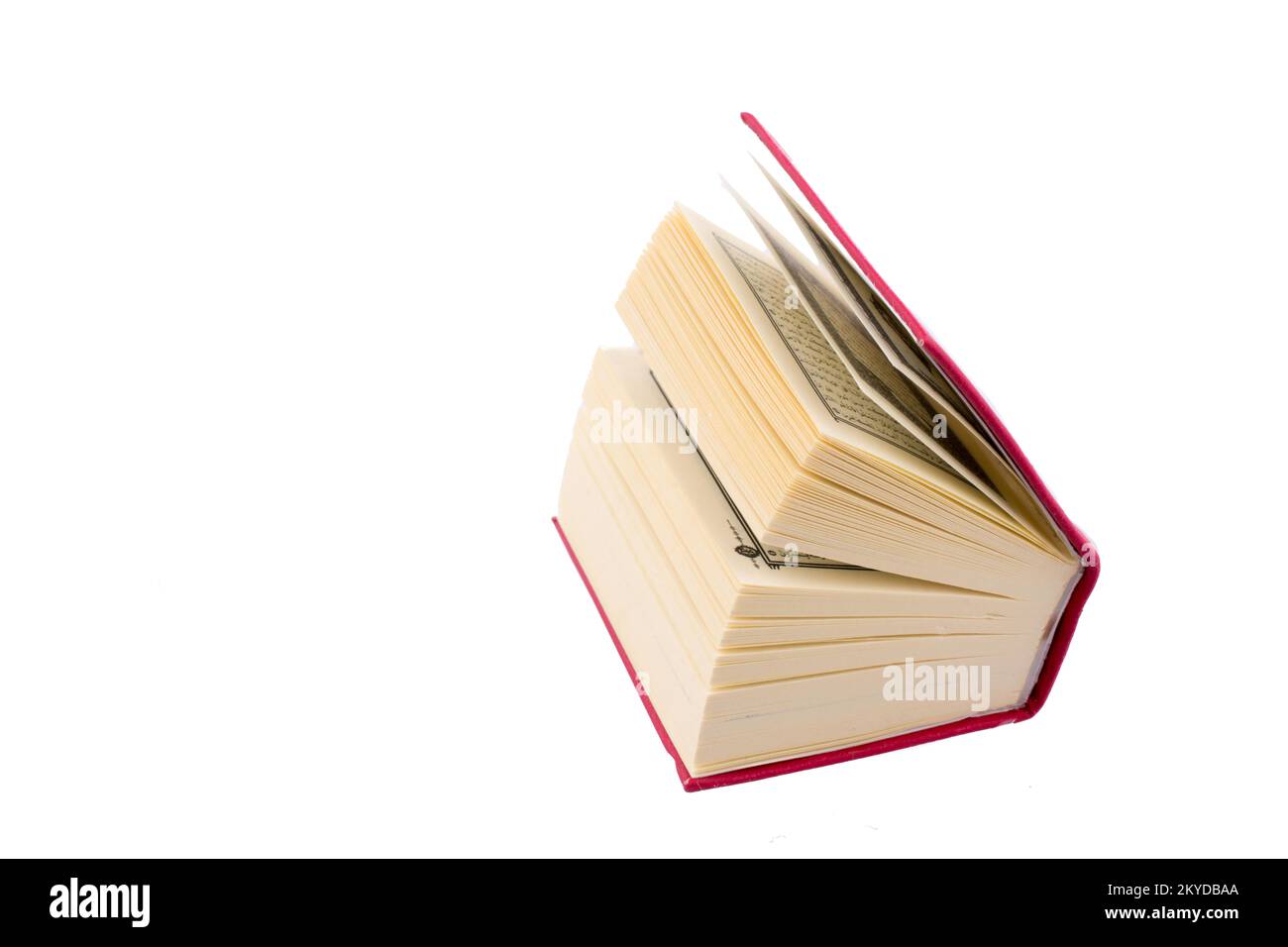 The Holy Quran on a white background Stock Photo - Alamy