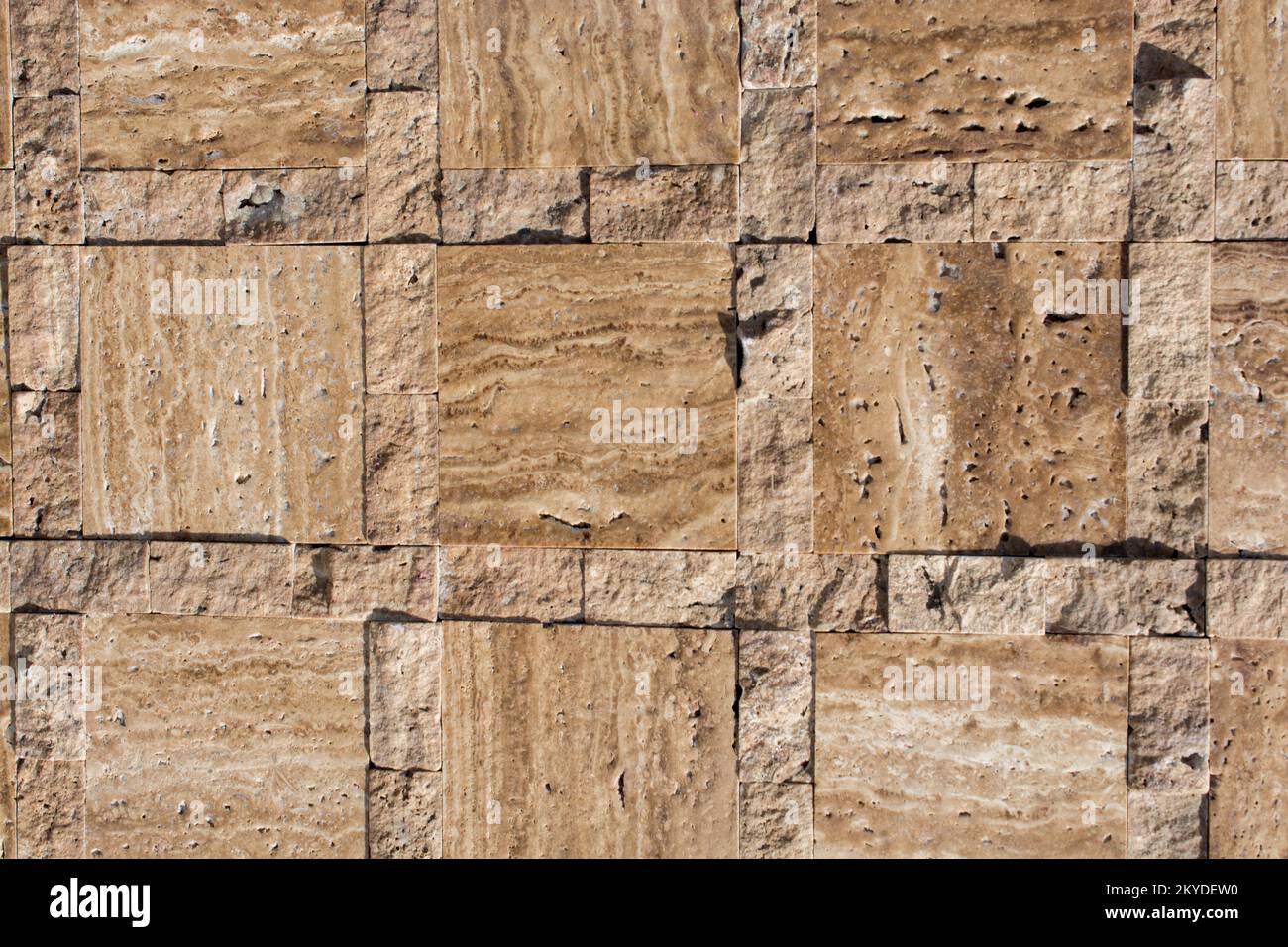 Decorative cubic stone wall as background texture Stock Photo - Alamy