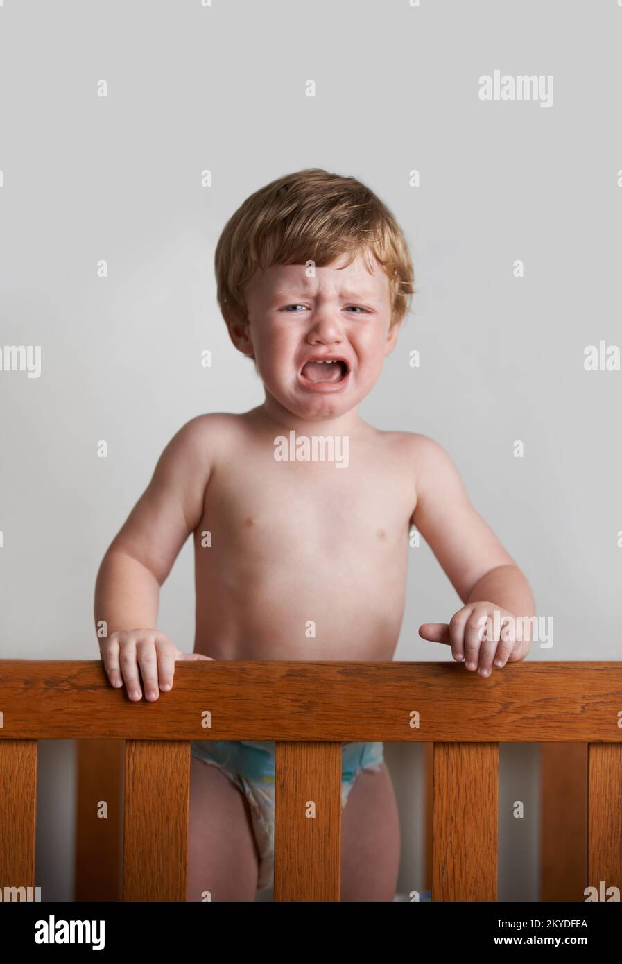 Baby crying crib hi-res stock photography and images - Alamy