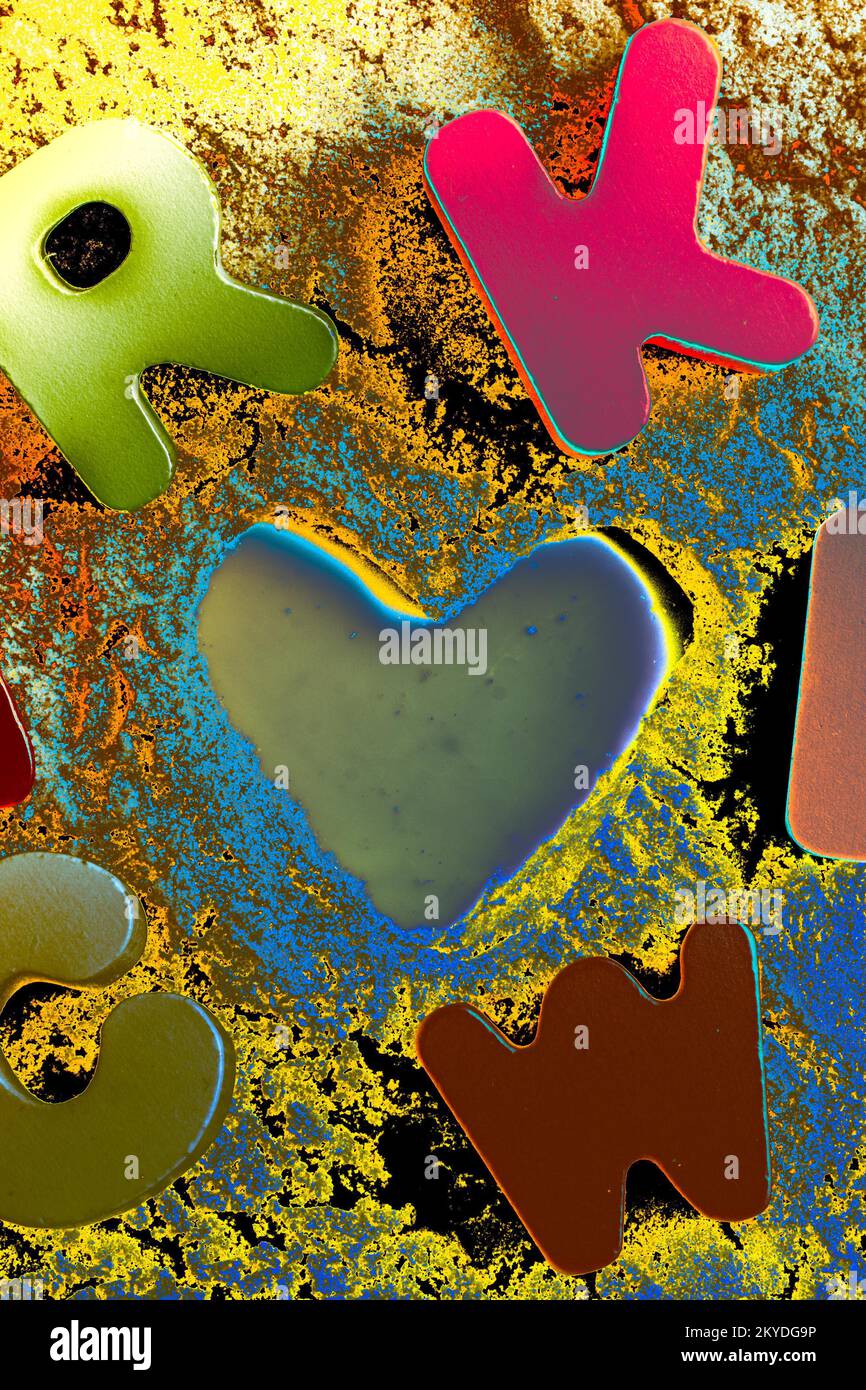 Heart shape and colorful Letters made of wood on sand Stock Photo - Alamy