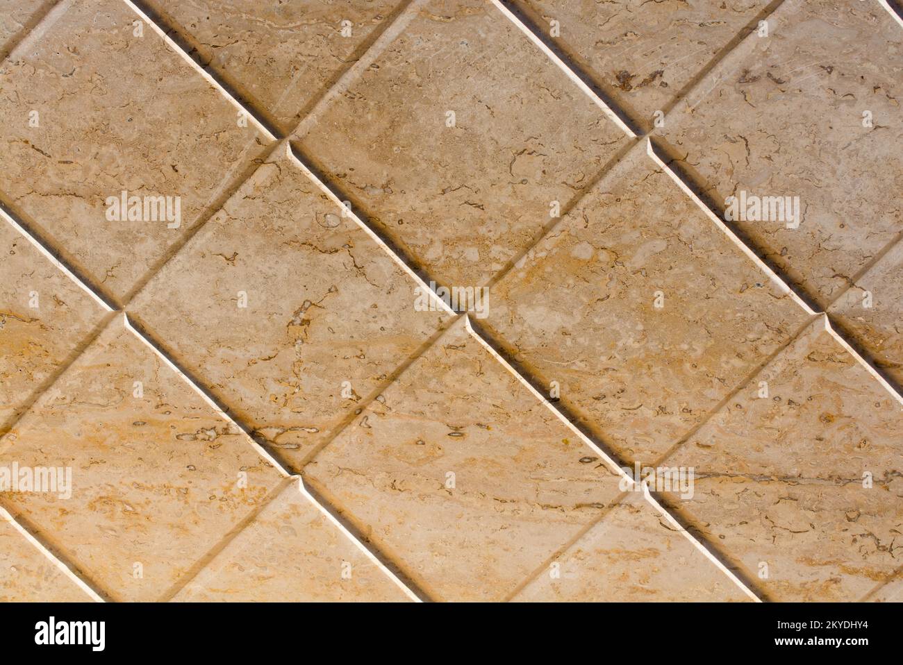 Decorative cubic stone wall as background texture Stock Photo - Alamy