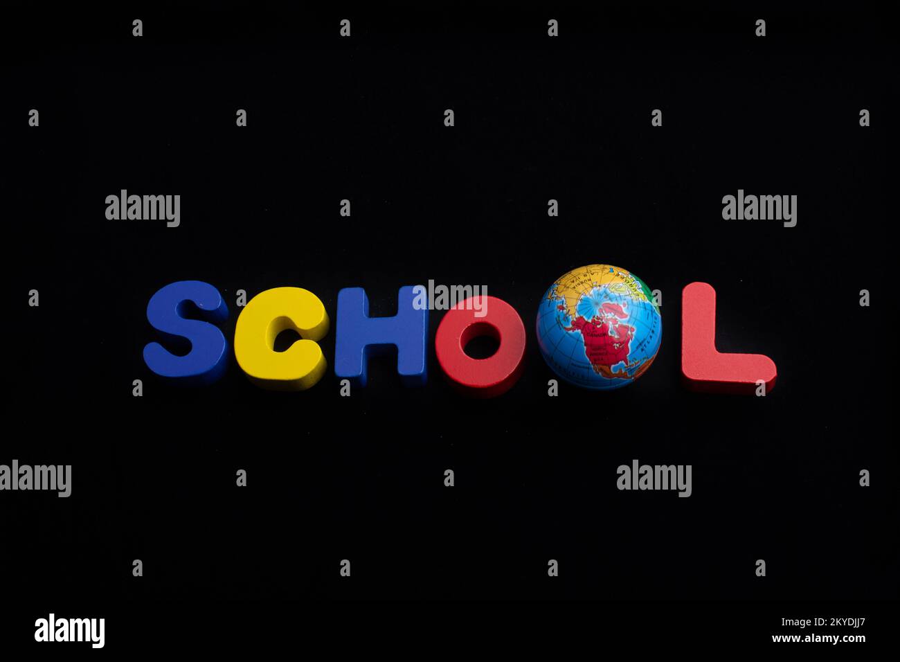 Education concept by School lettering with colorful wooden letters ...