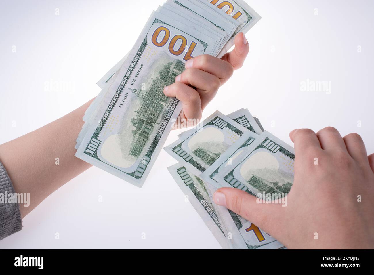 Human hand holding American dollar bill as money isolated on white ...