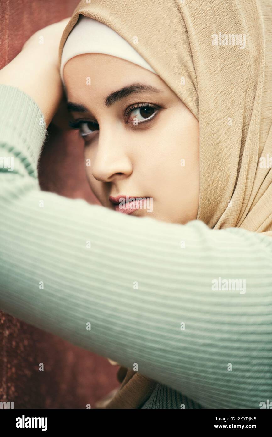 Beautiful muslim woman looking at camera outdoors Stock Photo - Alamy