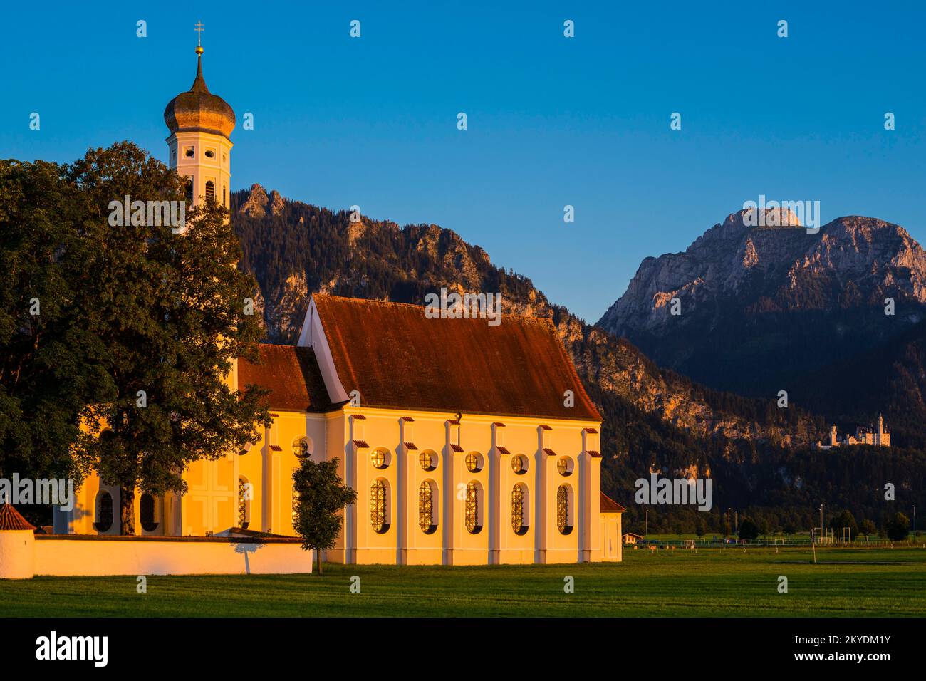 Pilgrimage Church of St. Coloman, behind it Neuschwanstein Castle ...