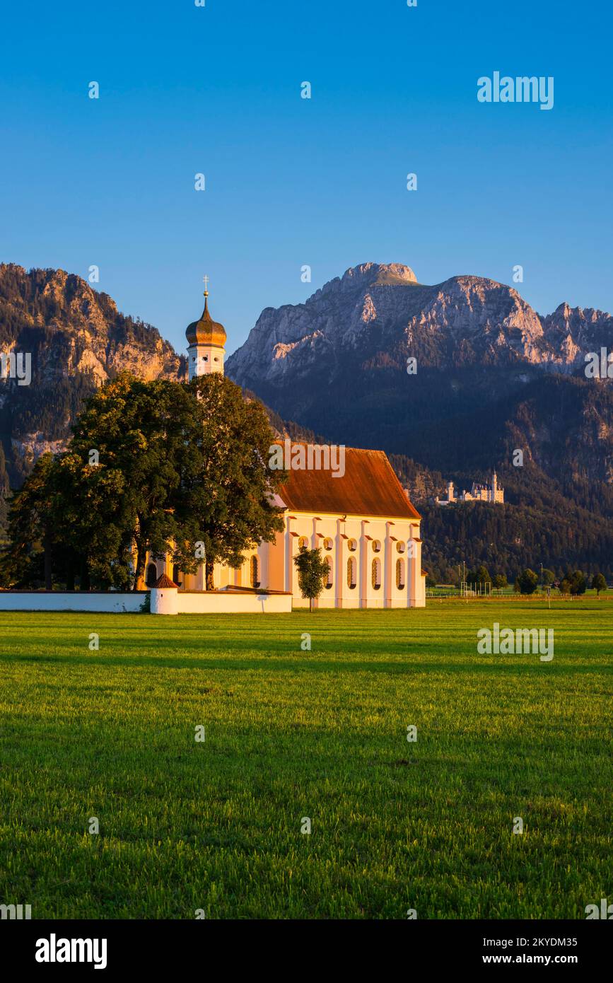 Pilgrimage Church of St. Coloman, behind it Neuschwanstein Castle ...