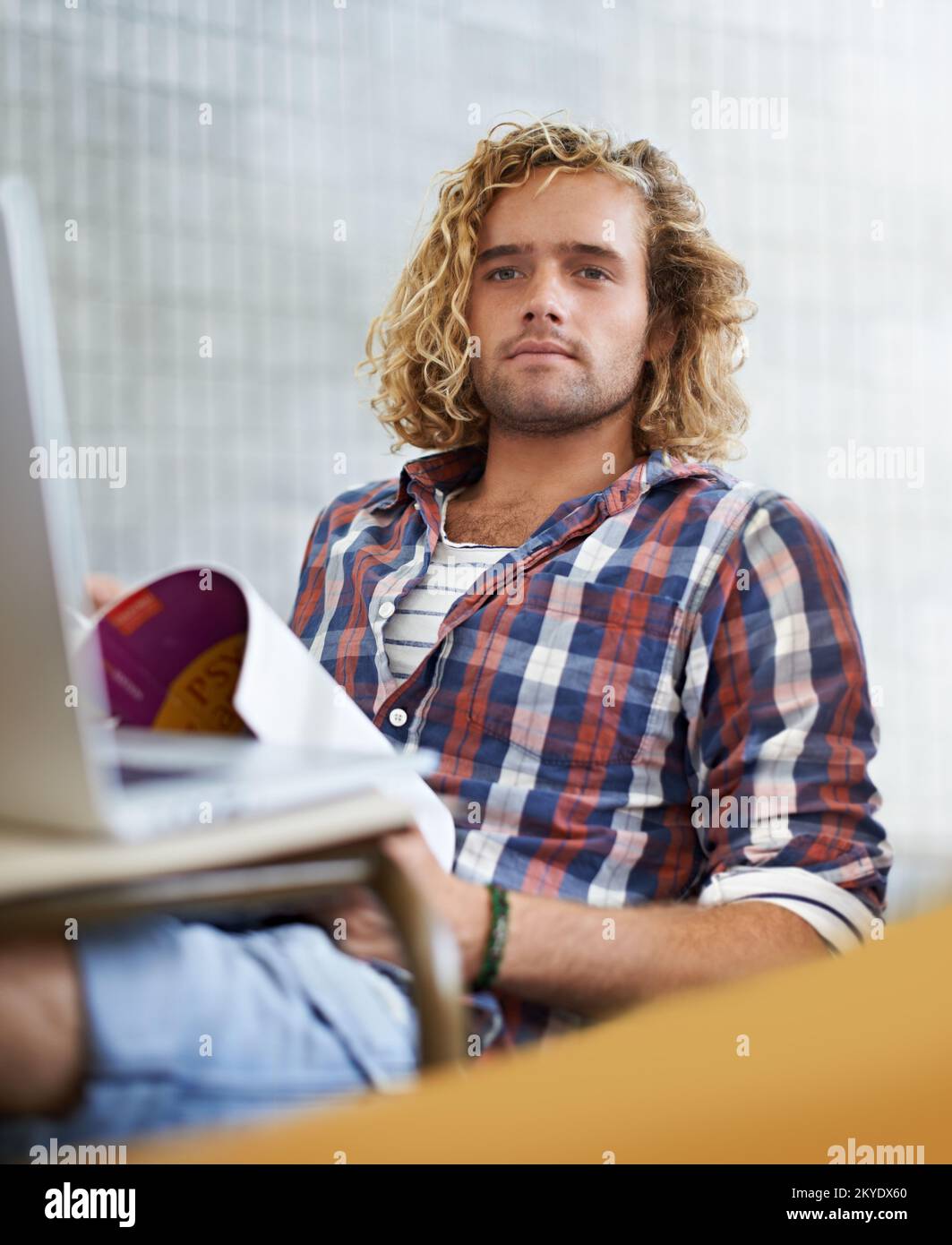 Studying hard to ensure future success. a college student studying in a ...