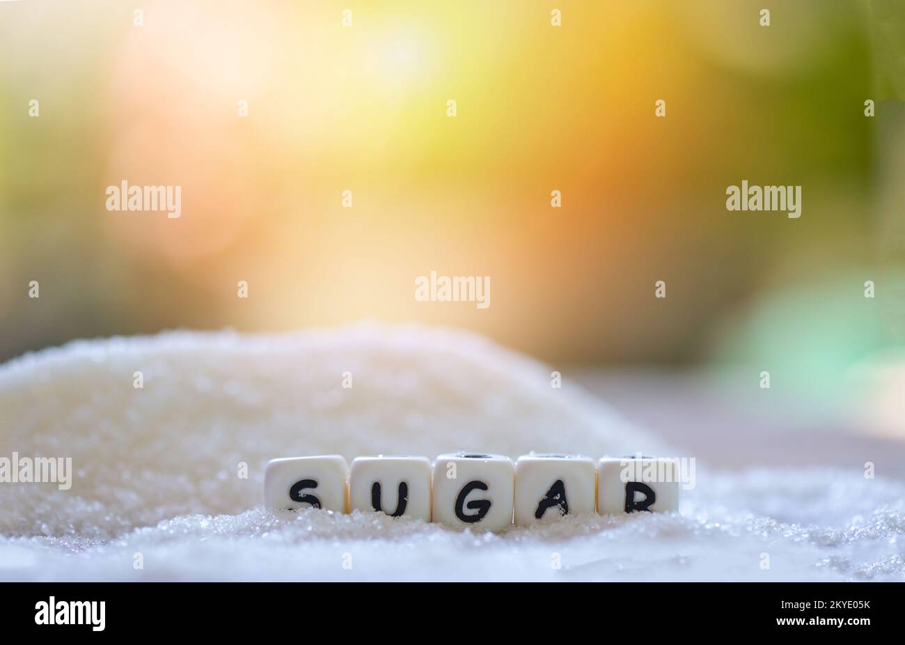 Sugar on nature blur background, white sugar for food and sweets ...