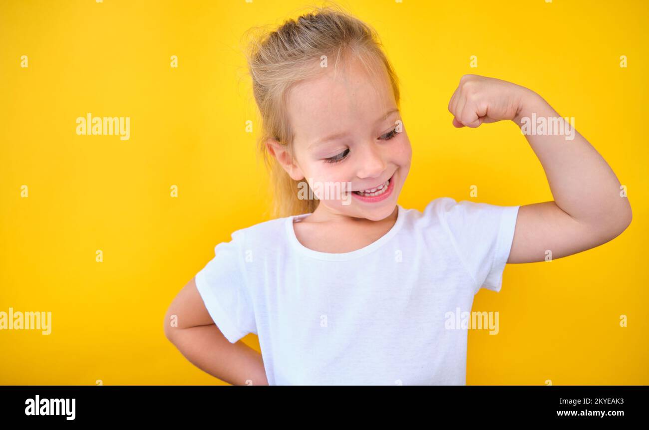 Kid flexing hi-res stock photography and images - Alamy