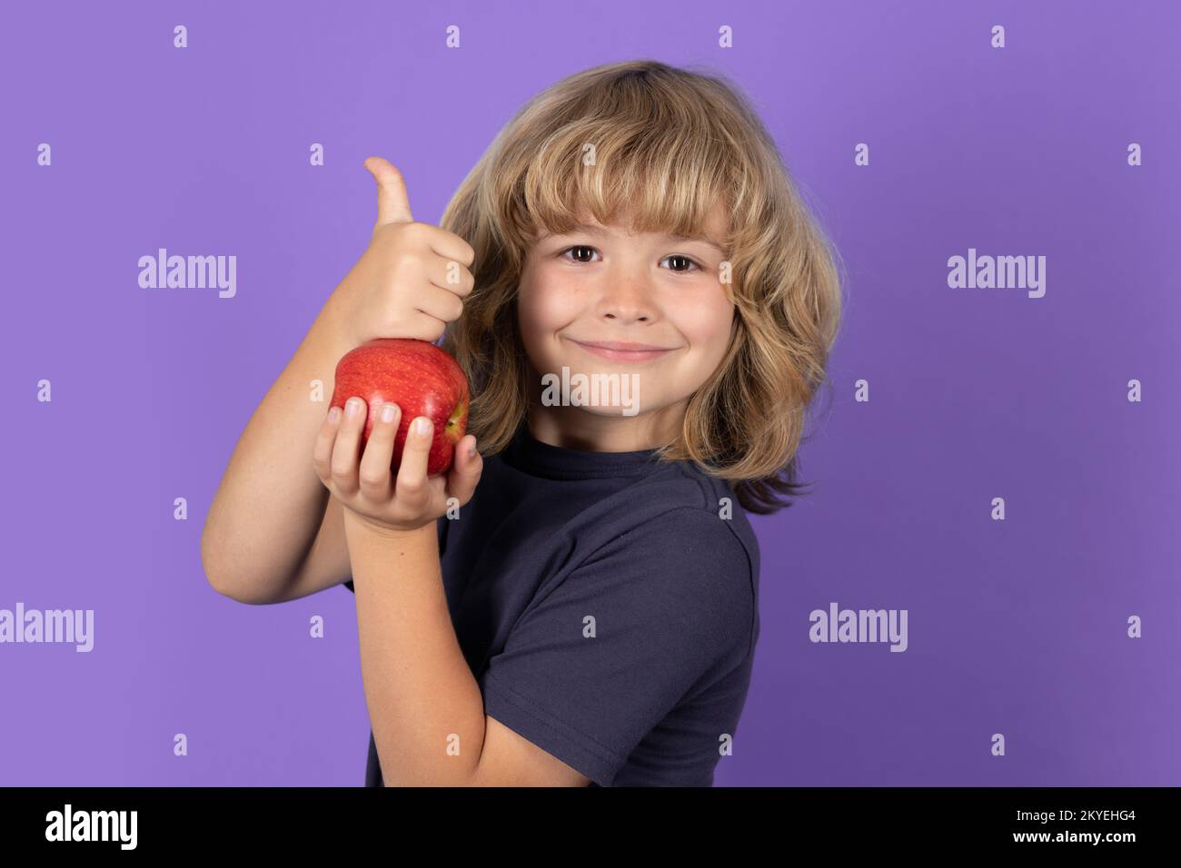 Healthy eating. Child kid with apple healthy fruit. Studio portrait ...
