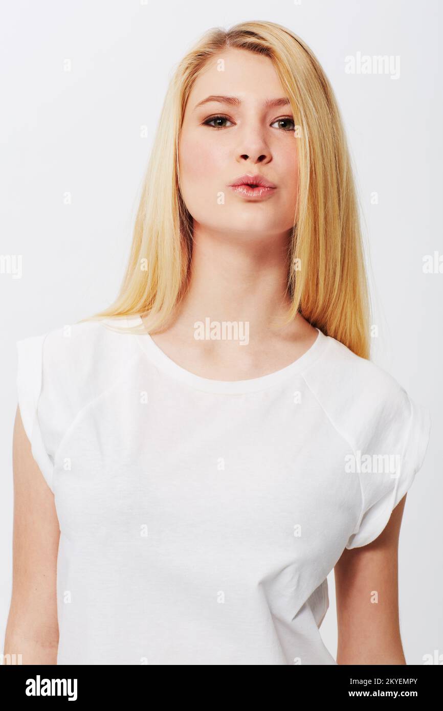 Natural, young and absolutely gorgeous. A pretty young blonde isolated ...