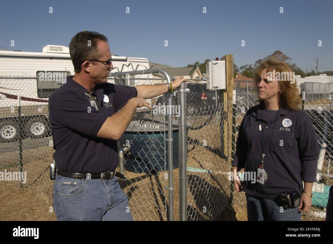 Hurricane Katrina, D'Iberville, MS, November 24, 2005 -- FEMA workers ...