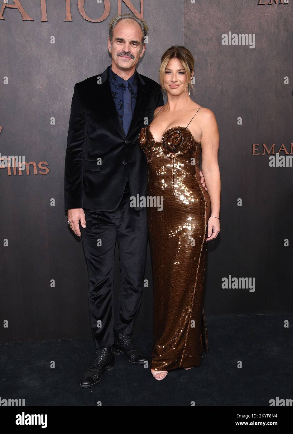 Westwood, USA. 30th Nov, 2022. Steven Ogg and Sarah Clark arriving to ...