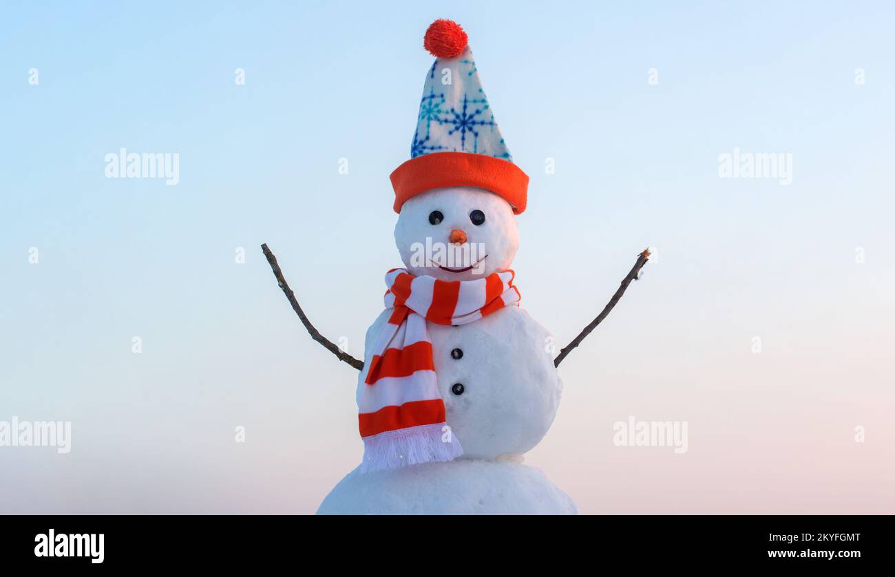 Funny snowman on the snow outdoor background. Christmas winter banner ...