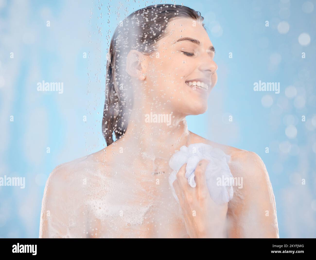Water, soap and skincare with woman in shower for beauty, self care and ...