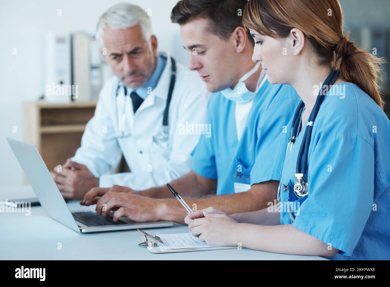 Medical professionals getting down to business. A group of doctors ...