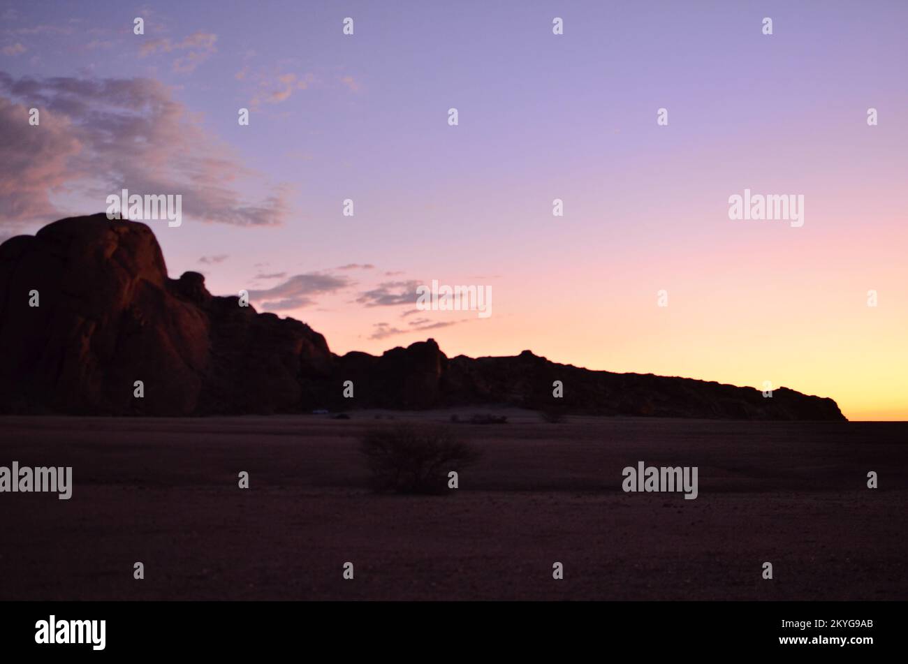 colorfull sunset in mirabib lonely scenic Granit Rock Desert namibia ...