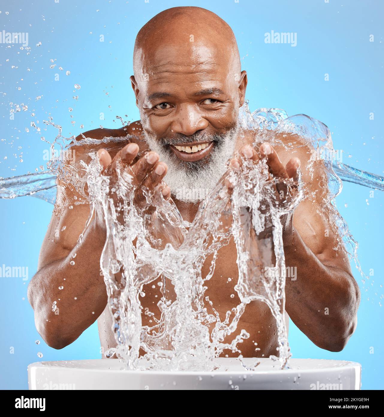 Black man, skincare and senior water splash in mockup of bathroom sink, clean skin health and ...
